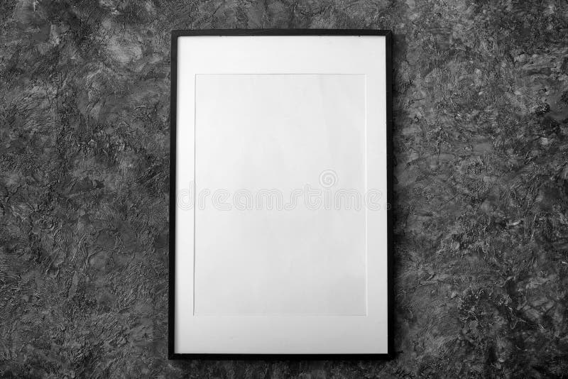 Blank Photo Frame Hanging on Dark Wall Stock Image - Image of room ...