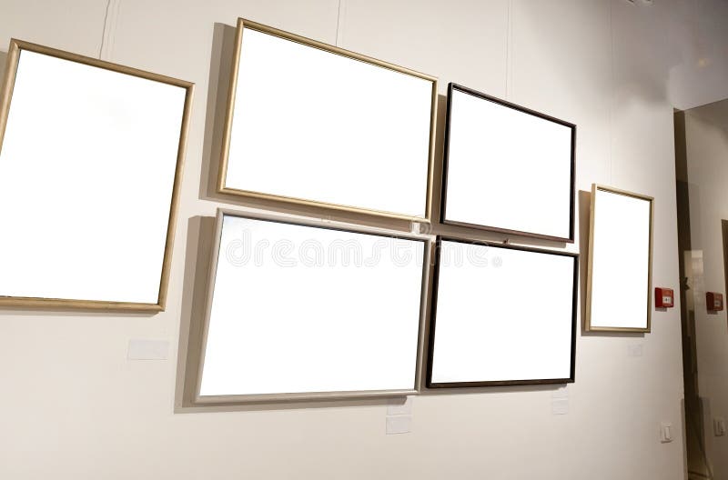 Blank Picture Frames on Grey Wall with Glowing Lamp, Mock Up Stock ...