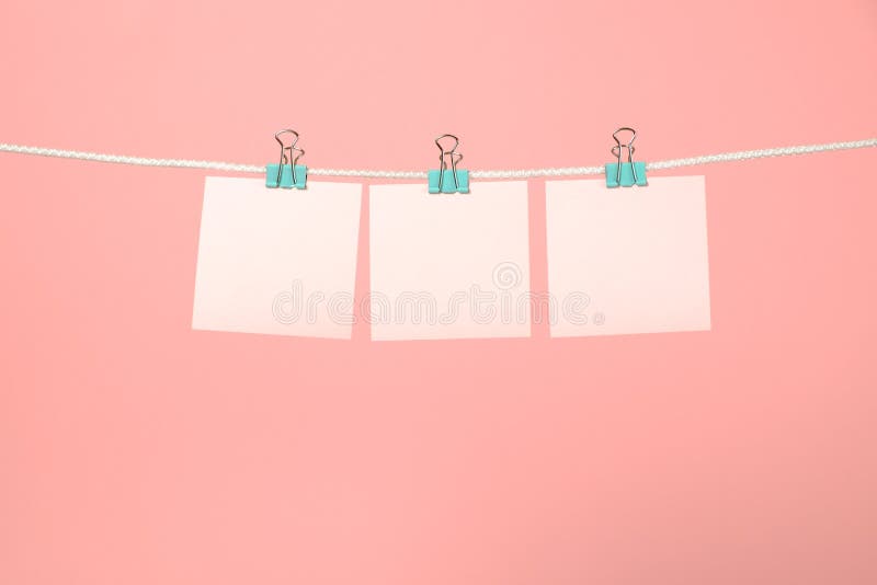 Blank Pink Paper Sheets Hanging on String Stock Photo - Image of empty ...