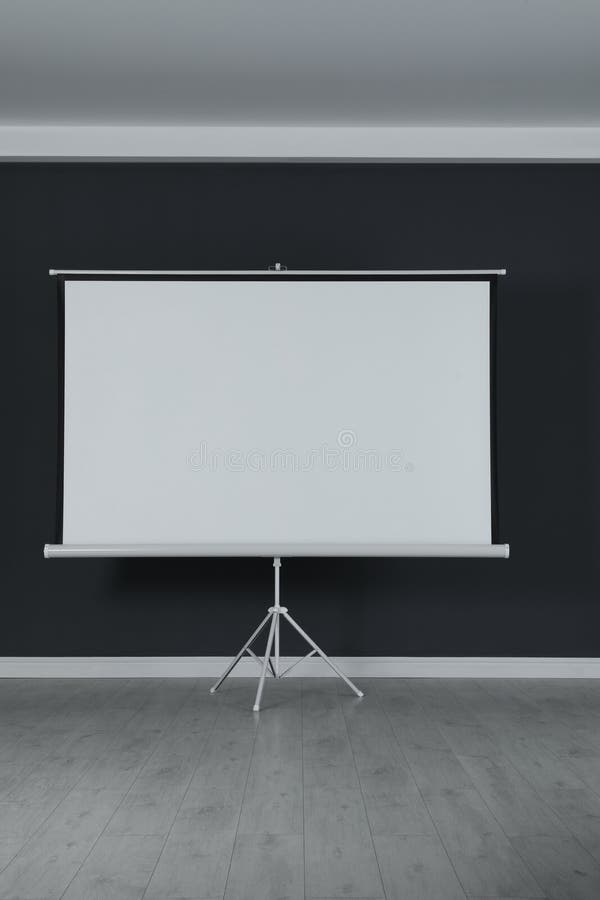 Blank Projection Screen Near Black Wall Indoors. Space for Design Stock ...