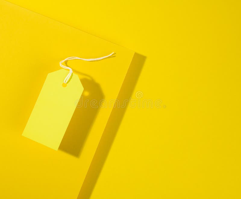 Yellow price tag on white stock photo. Image of information - 5410486