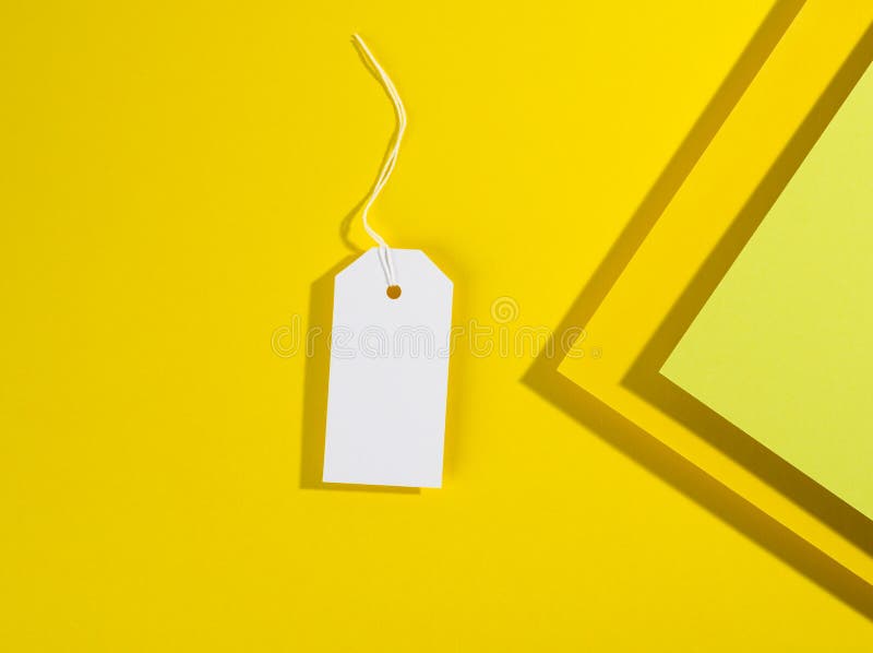 Yellow price tag on white stock photo. Image of information - 5410486
