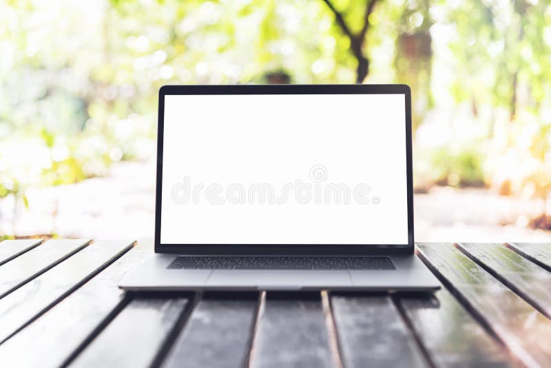 Blank Screen Laptop Computer on Wood Table in Outdoor Cafe. Stock Image ...