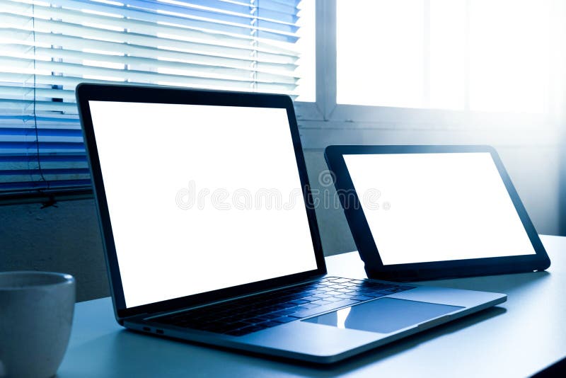 Blank Screen Laptop and Tablet Computer on the Table Stock Image ...