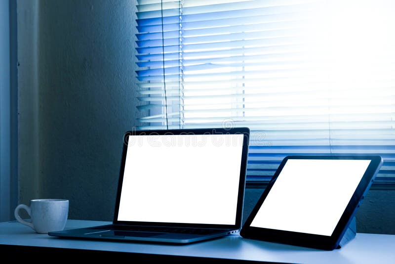 Blank Screen Laptop and Tablet Computer on the Table Stock Photo ...