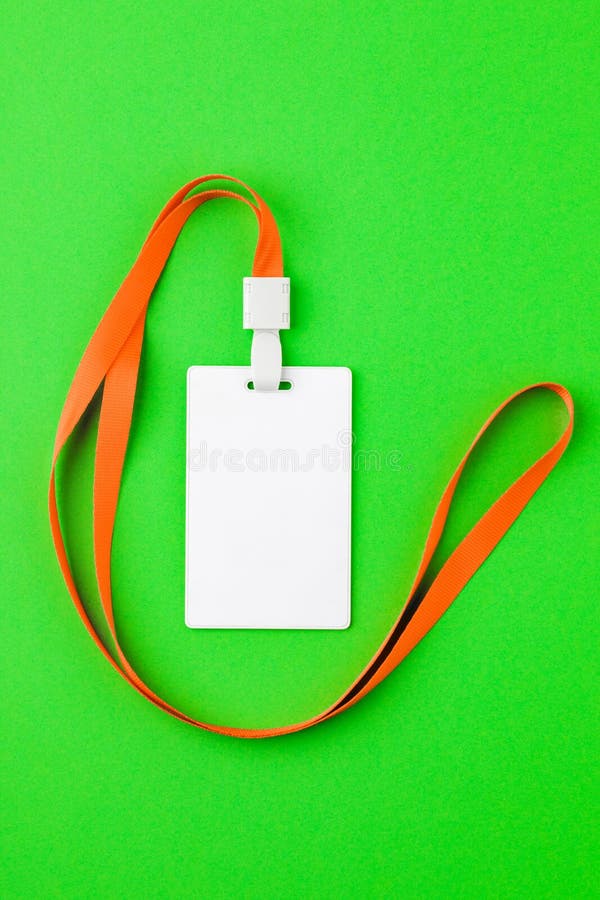 Blank Security Tag with a Red Stripe Neck on a Green Background. Place ...