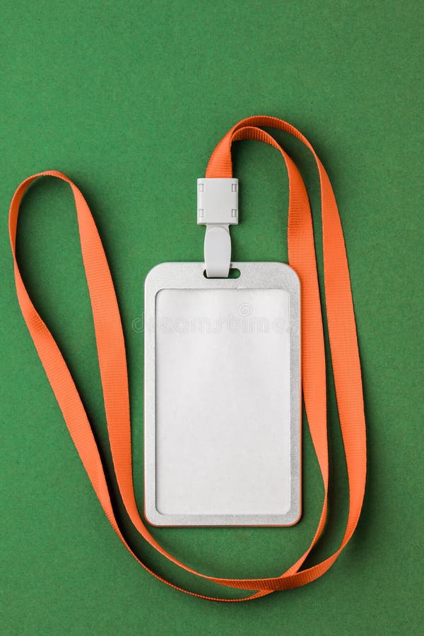 Blank Security Tag with a Red Stripe Neck on a Green Background. Place ...