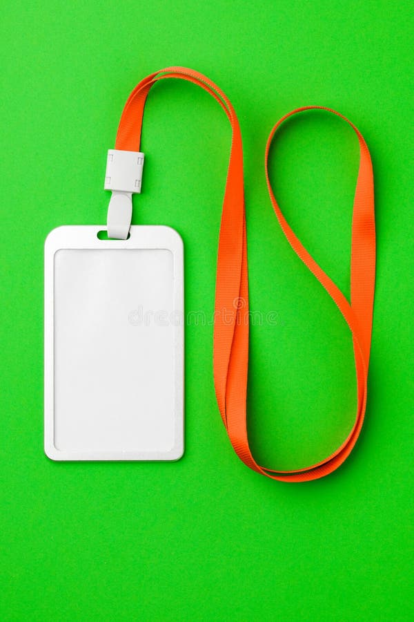 Blank Security Tag with a Red Stripe Neck on a Green Background. Place ...
