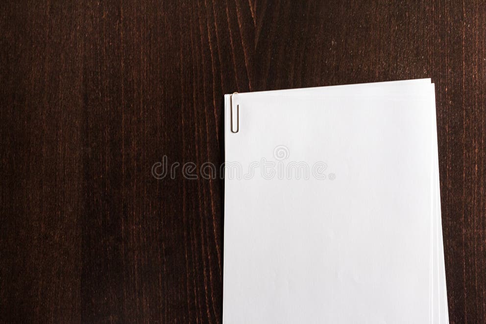 Blank sheets on desk notes stock image. Image of wooden - 144410661