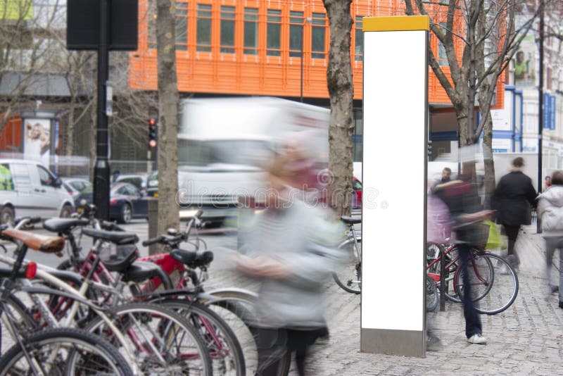 Blank sign in a busy city stock image. Image of white - 13823283