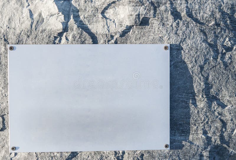 A Blank Sign Plate on a Stone Wall Stock Photo - Image of board, plaque ...