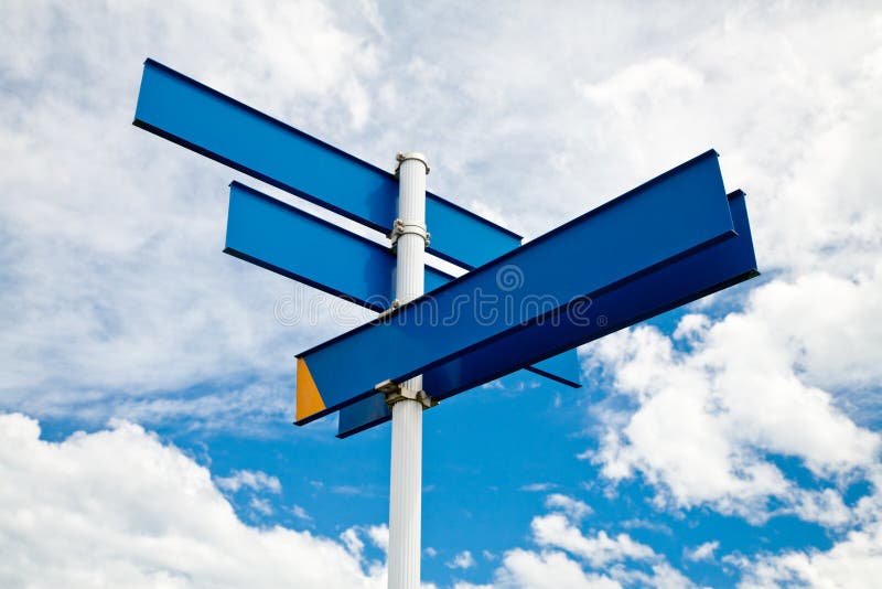 Crossroads with Confusing Directional Arrow Sign Stock Image - Image of ...