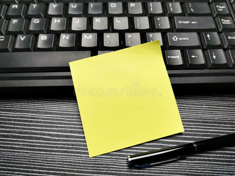 Blank Sticky Note with a Pen and Keyboard on the Table. Stock Photo ...