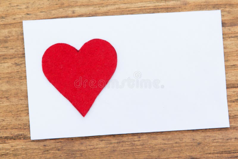 Blank Sticky Note with a Red Heart on a Wooden Background Stock Image ...