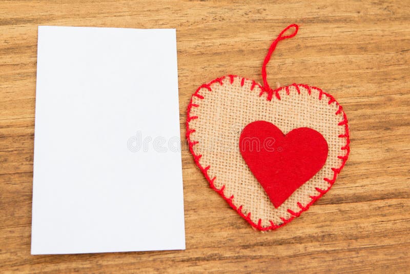 Blank Sticky Note with a Red Heart on a Wooden Background Stock Photo ...