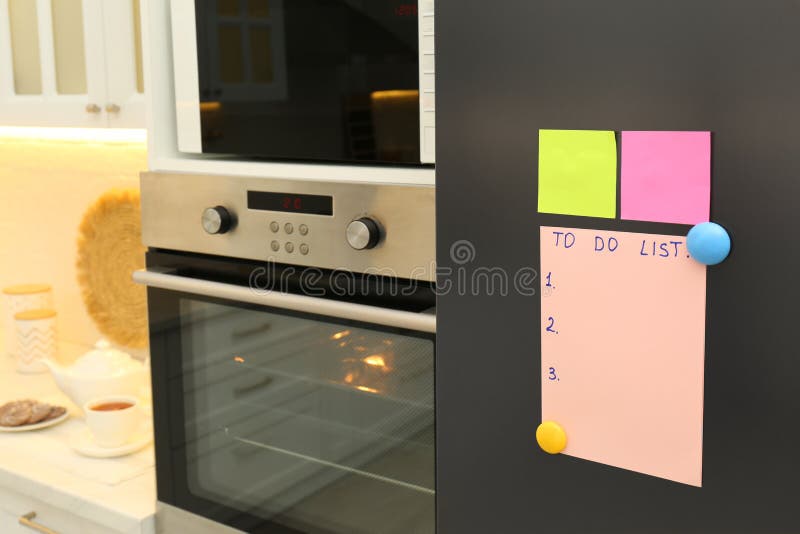 Blank To Do List and Sticky Notes on Fridge in Kitchen. Space for Text ...