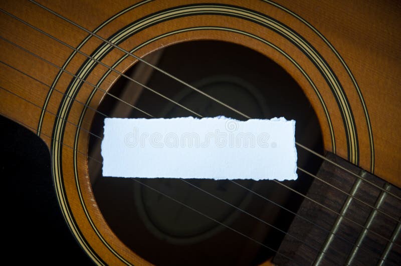 Blank Torn Paper on Guitar Strings. Copy Space and Music Concept Stock ...