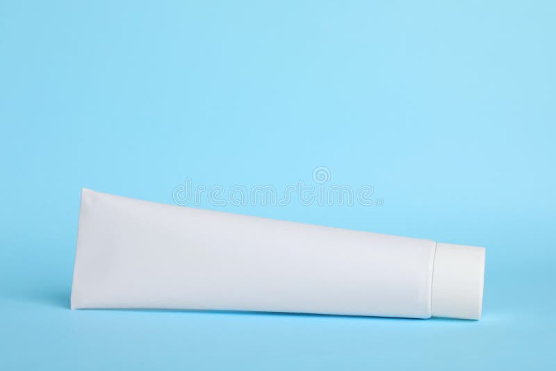 Blank Tube of Toothpaste on Light Blue Background. Space for Text Stock ...
