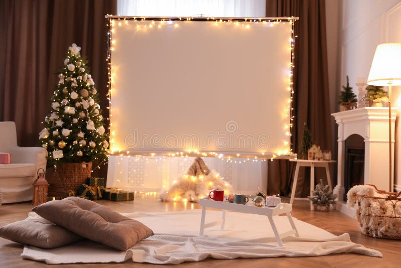 Blank Video Projector Screen in Room Decorated for Christmas. Cozy ...