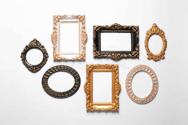 Blank Vintage Frames Hanging on White Wall Stock Photo - Image of ...