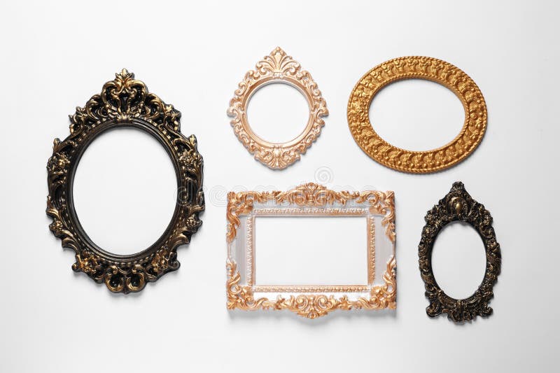 Blank Vintage Frames Hanging on White Wall Stock Image - Image of ...