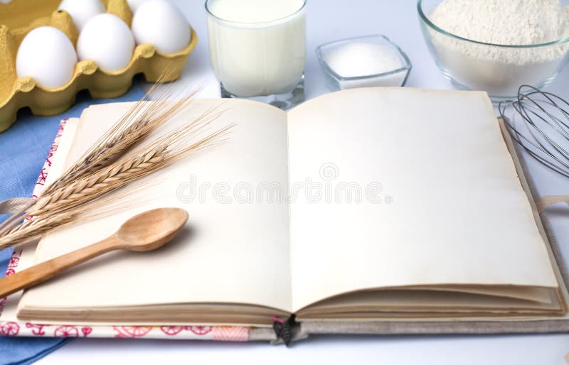 A Blank Vintage Recipe Book and Baking Ingredients are on the Kitchen ...