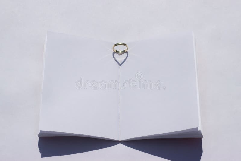 Blank Wedding Book and Ring Heart-shaped Shadow Stock Photo - Image of ...