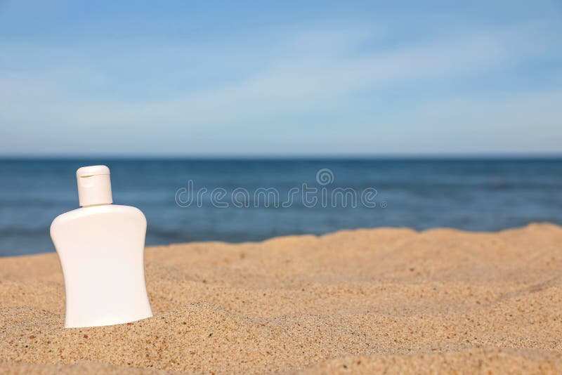 Blank White Bottle of Sunscreen on Sand Near Sea, Space for Text Stock ...