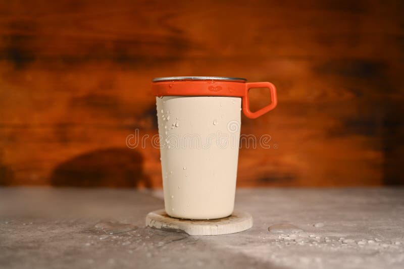 Blank White Ceramic Travel Cup with Handle on Stone Table. Tumbler ...