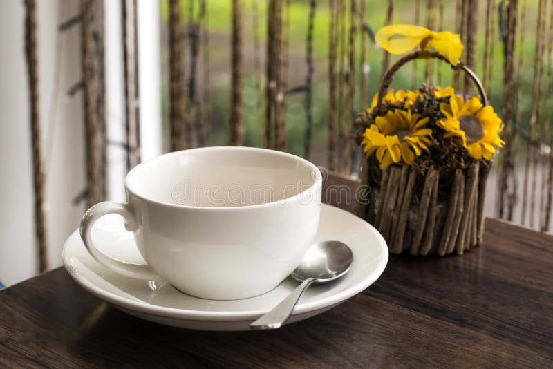 Blank White Cup with a Teaspoon on the Table Stock Photo - Image of ...