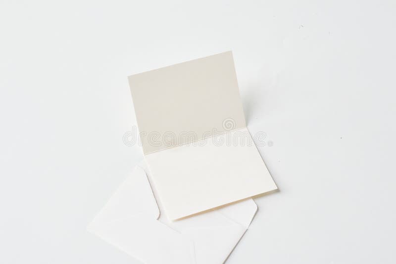 Blank White Greeting Card Placed Next To an Empty Envelope on a Clean ...
