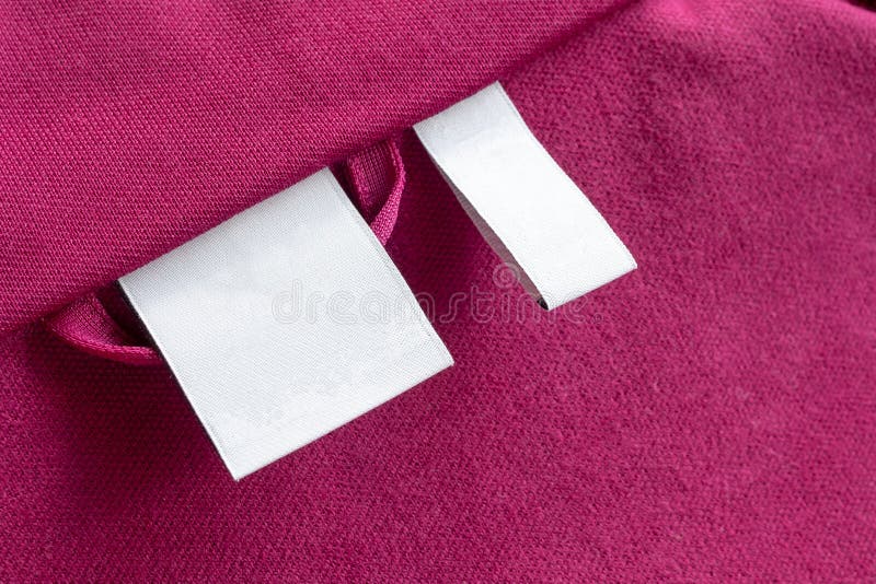 Blank White Laundry Care Clothes Label on Red Fabric Texture Background ...