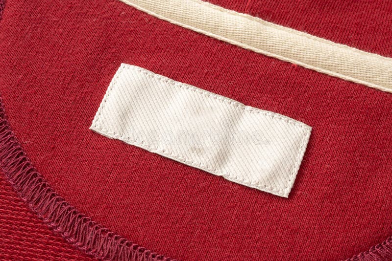 Blank White Laundry Care Clothes Label on Red Fabric Texture Background ...