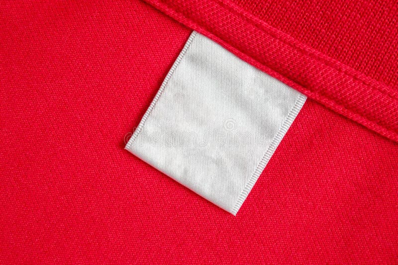 Laundry Care Clothes Label on Red Shirt Fabric Texture Background Stock ...
