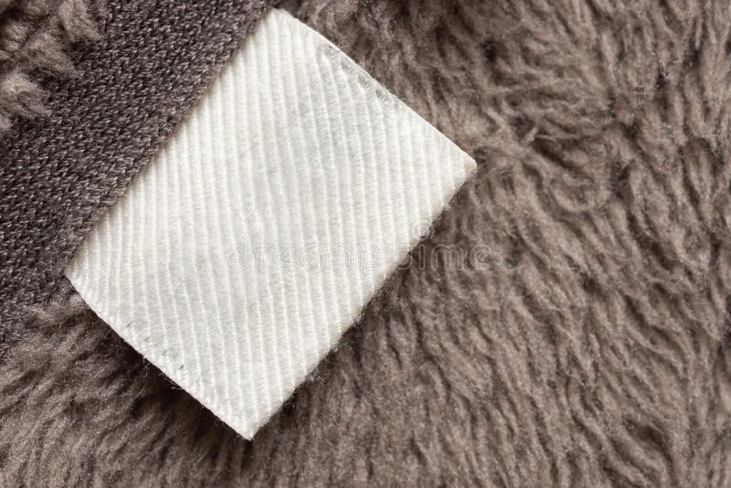 Blank White Laundry Care Clothing Label on Fur Texture Background Stock ...