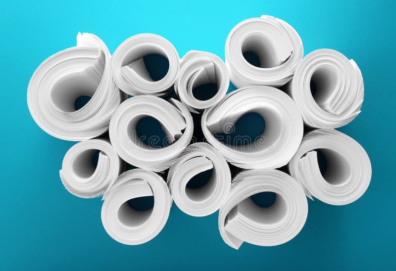 Blank White Paper Rolls on Light Blue Background, Flat Lay Stock Photo ...