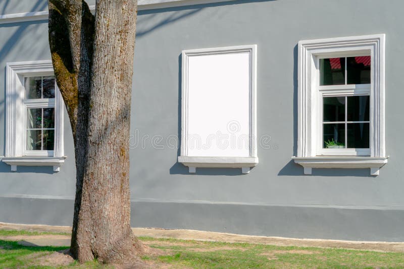 Blank White Poster Frame on the Window of Classic Architecture Building ...