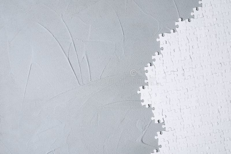 Blank White Puzzle Pieces on Grey Stone Background, Flat Lay. Space for ...