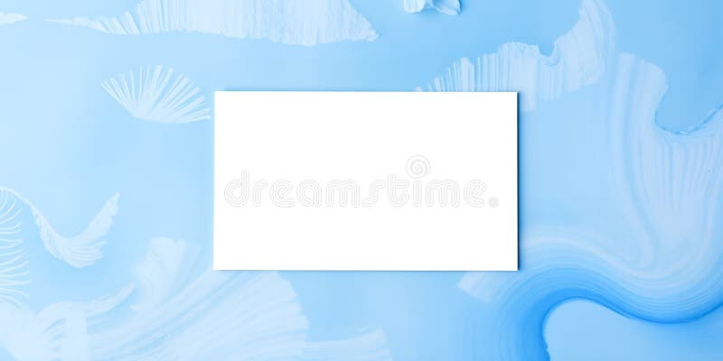 A Blank White Rectangle Card Centered on a Light Blue Watercolor ...