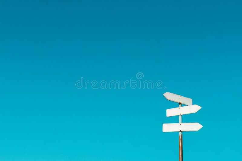 Blank White Road Signs on a Single Pole Pointing in Different ...