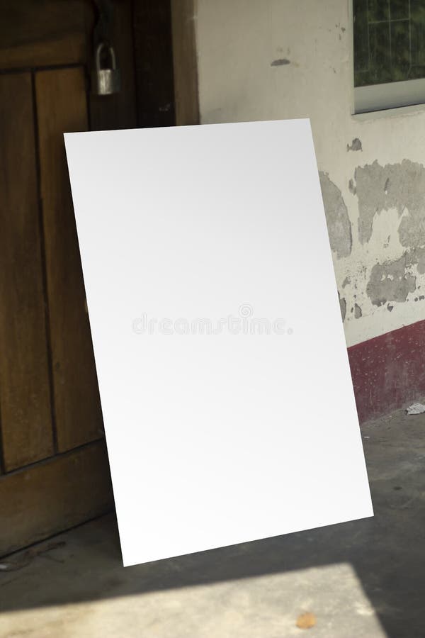 A Blank White Sign Board Leaning Against a Tree, Real Shadow, and the ...