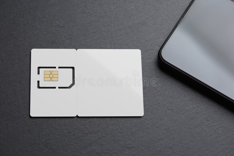 Blank White SIM Card with Smartphone on Black Slate. 3D Rendering and ...