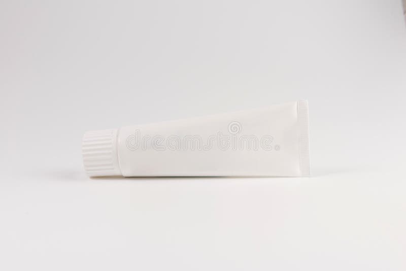 Blank White Tube of Toothpaste, Cream or Gel Laying on White Background ...