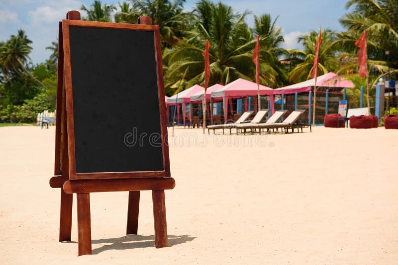 Wooden Chalkboard Stand in Sand on Tropical Beach Stock Image - Image ...