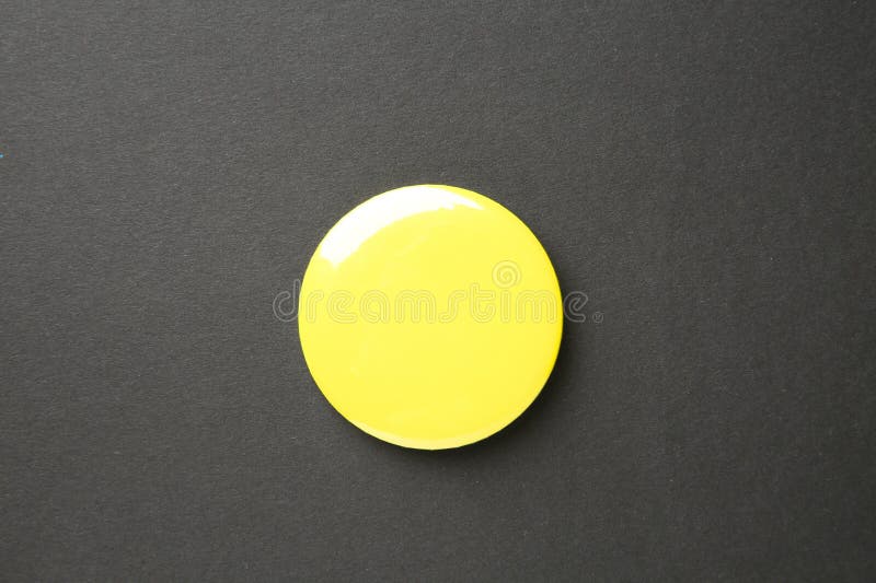 Blank Yellow Button Badge on Black Background, Top View. Mockup for ...