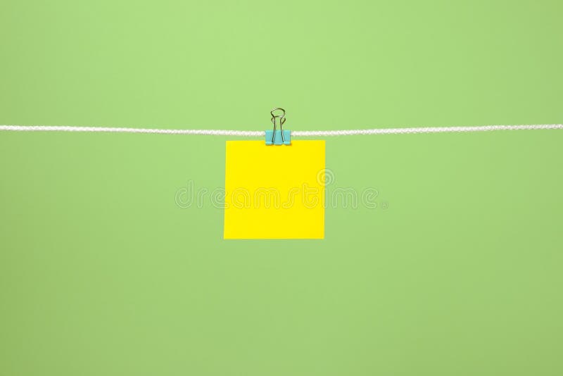 Blank Yellow Paper Sheet on the String Stock Photo - Image of ...