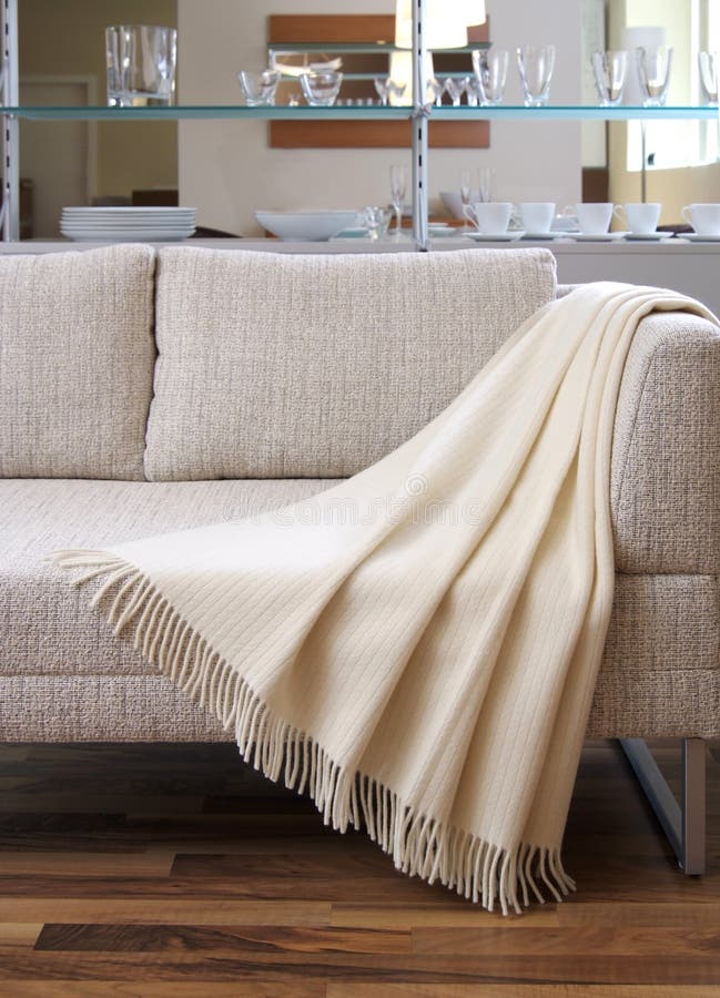 Blanket Draped Over a Settee Stock Image - Image of settee, dining: 7744961