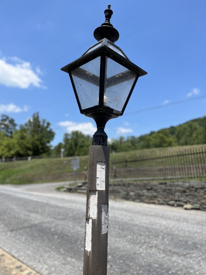 At blazes on a lamp post stock photo. Image of lamp - 283684778