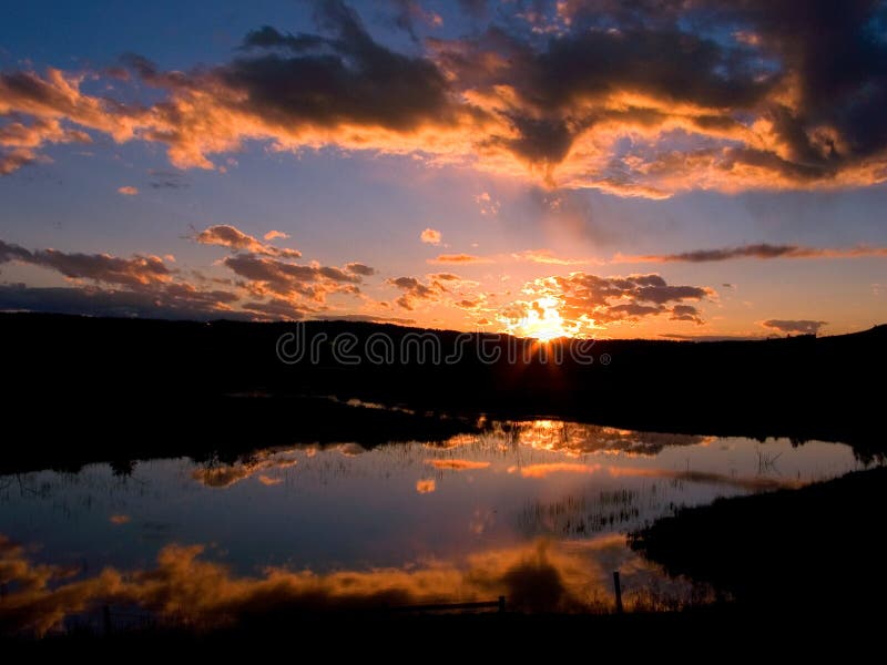 Blazing Sunset stock image. Image of nature, gorgeous, reflect - 502133