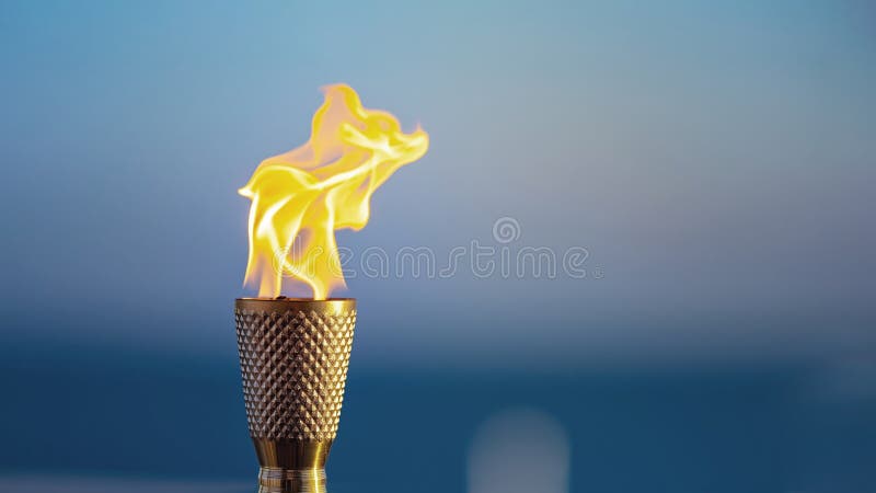 Blazing Torch Flame on Dark Blue Gradient Background, Casting Bright ...
